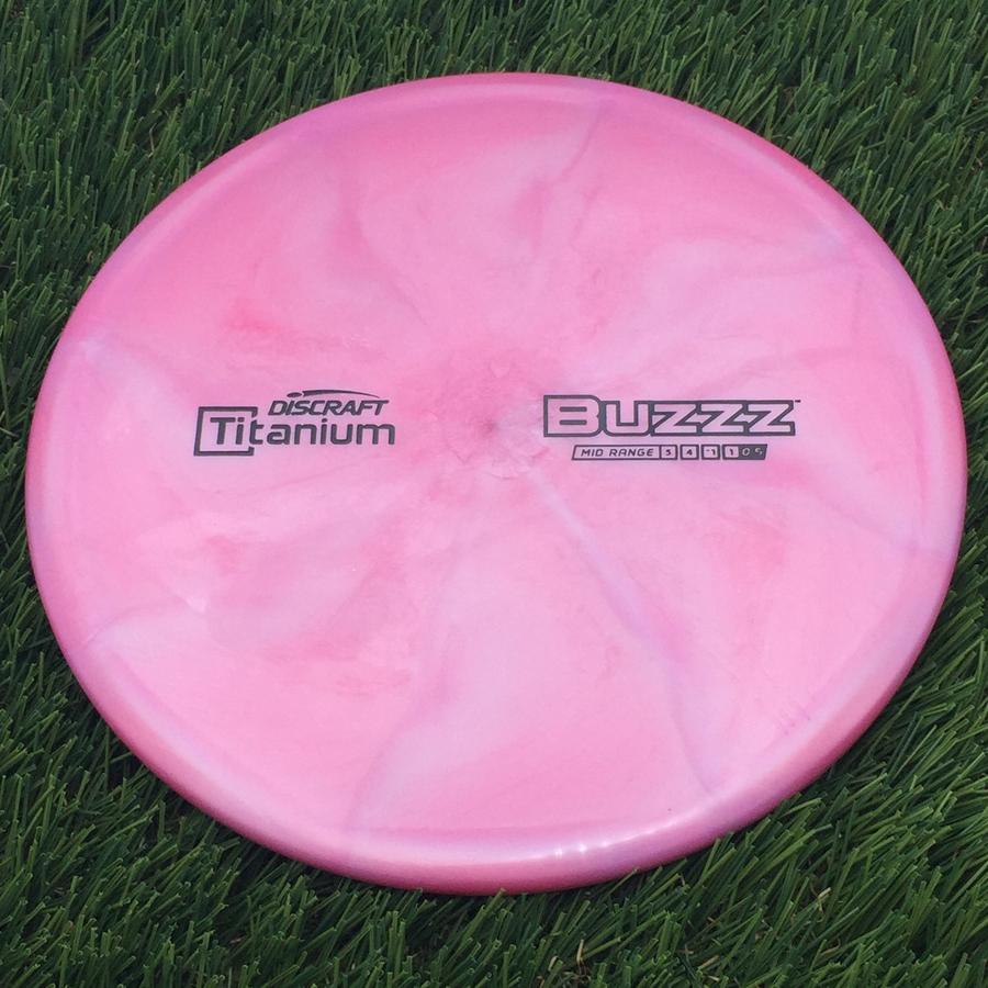 Discraft Ti Blend Titanium Buzzz - 179.9g - Pink – Drop Zone Disc Golf ...